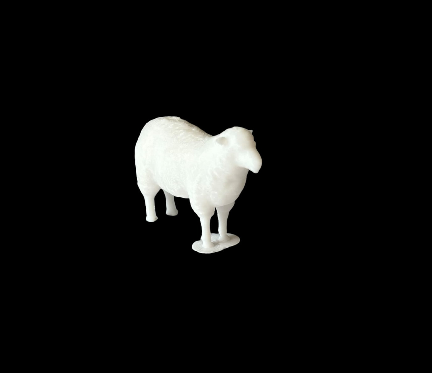 Five miniature sheep for OO or O gauge scenes.